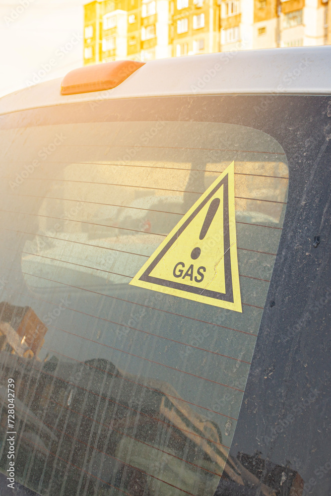 sticker on a car warning that the car is powered by propane gas fuel ...