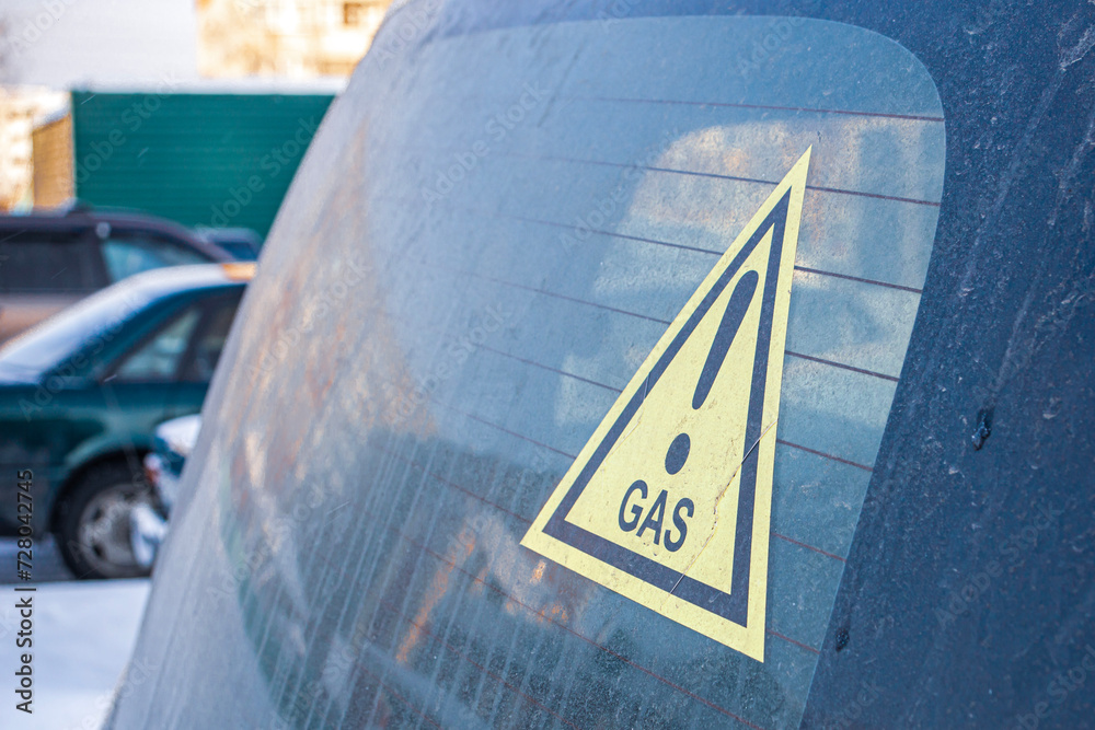 sticker on a car warning that the car is powered by propane gas fuel ...