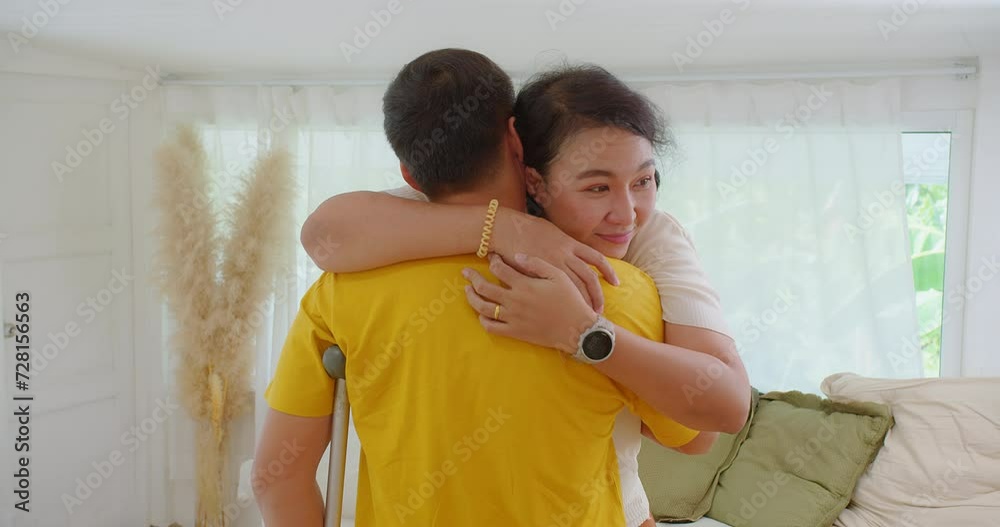 Embracing couple shares a heartfelt hug in a minimalist white room ...