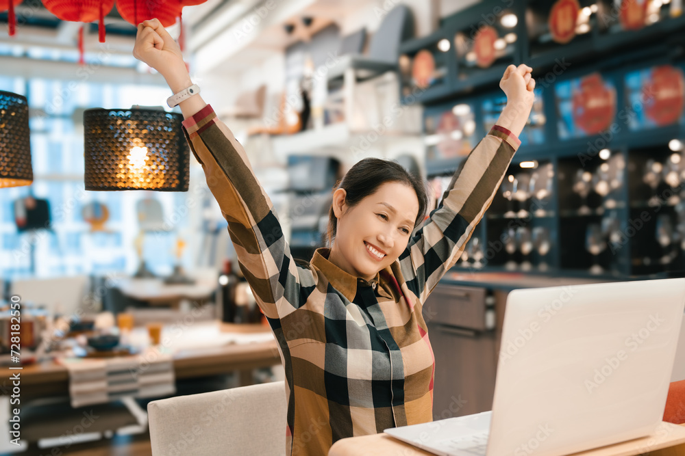 Asian commercial women are satisfied with the work of tablets and ...