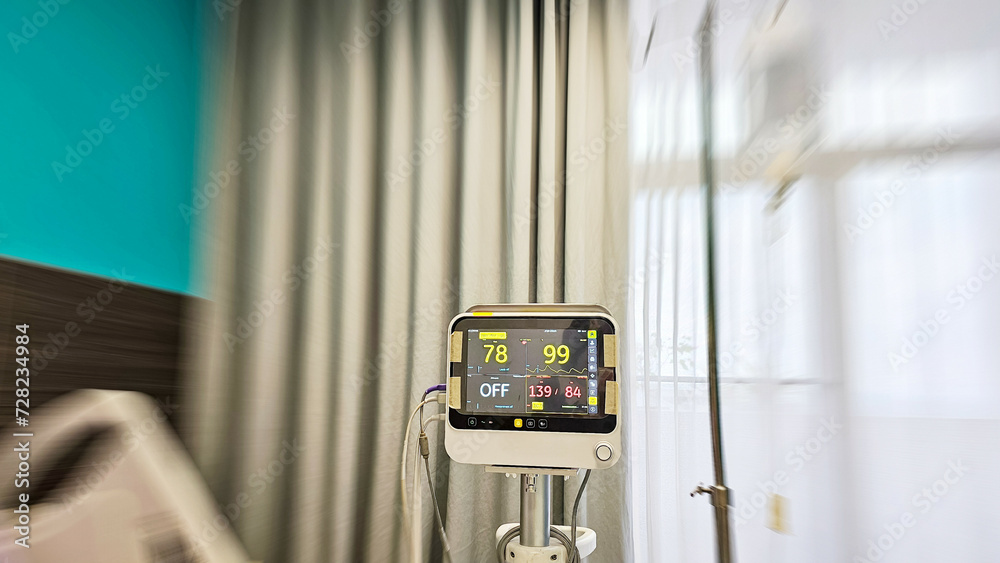 Vital signs monitor showing Heart rate and blood pressure of patient in ...