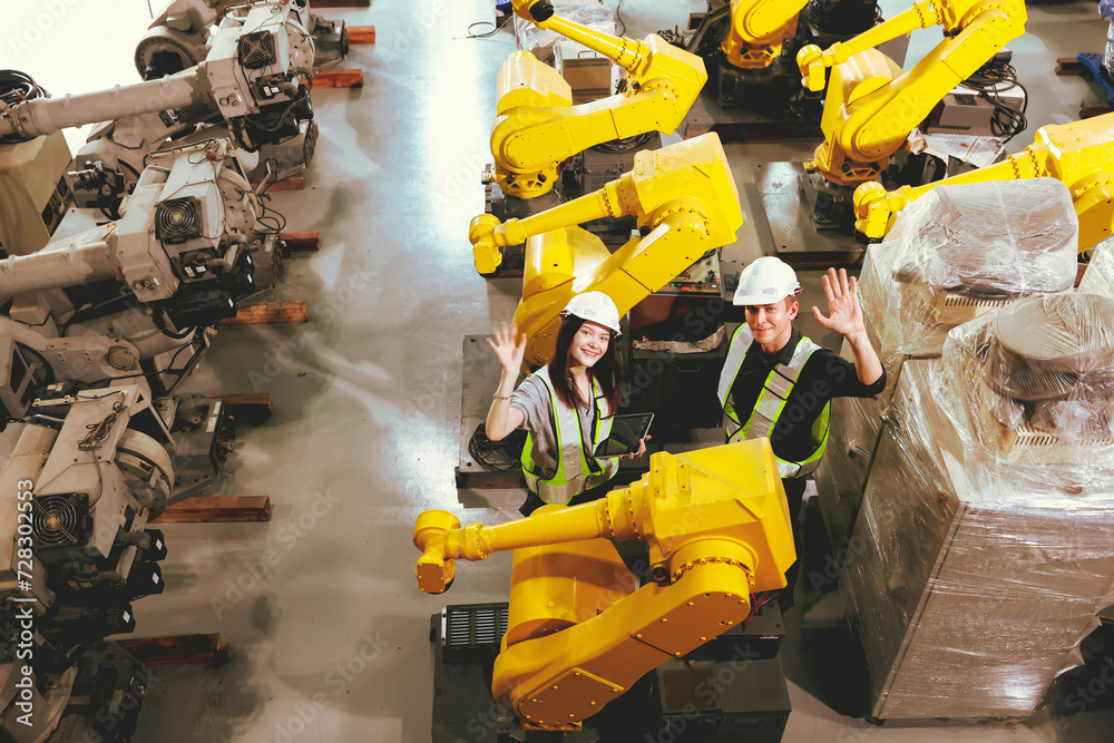 Top view male and female electrician engineers greeting waving looking ...