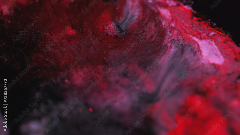 Ink spill. Paint splatter. Blur red silver black color shimmering ...