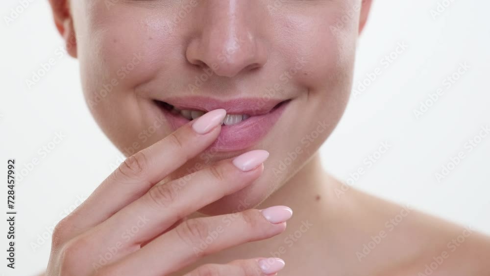 Close up shot of young woman smiling lips and opening mouth on white ...