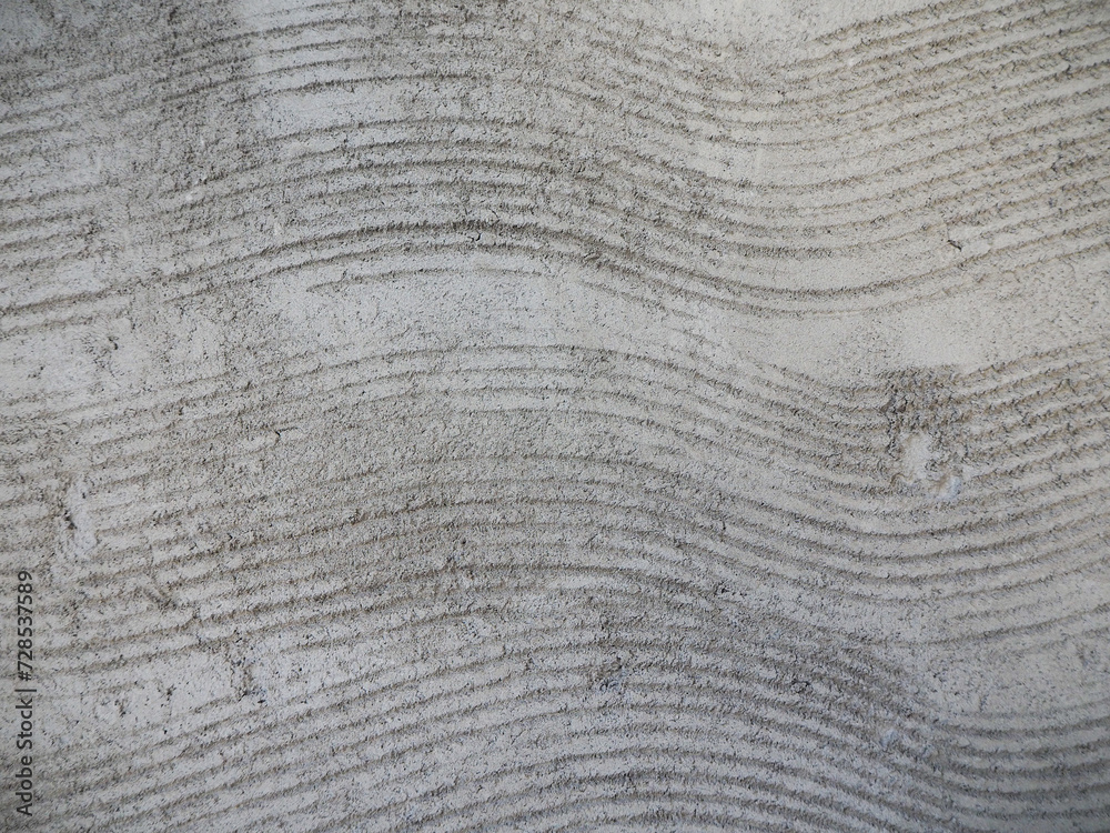 The concrete walls have been made ready for plastering. The cement ...