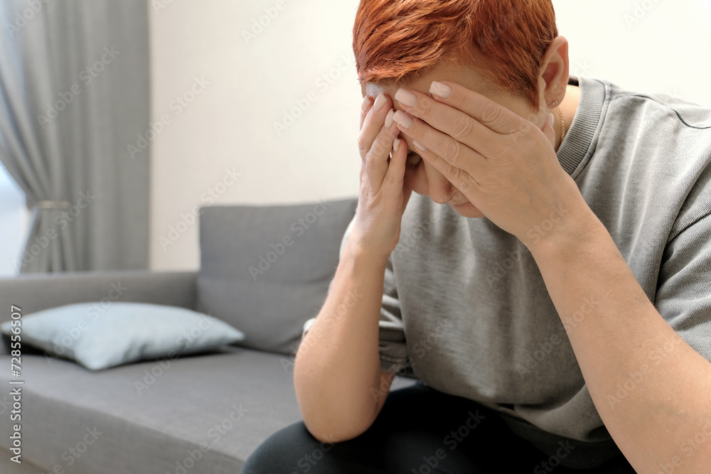 A common mood disorder. The low angle of a mature woman, the emotions ...