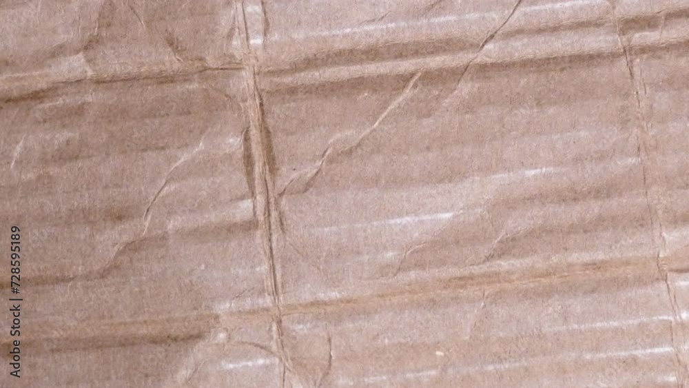 Stop Motion: Corrugated cardboard with natural crease lines, spinning ...