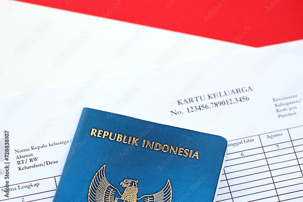 Kartu keluarga Family Identity Card with indonesian passport close up ...