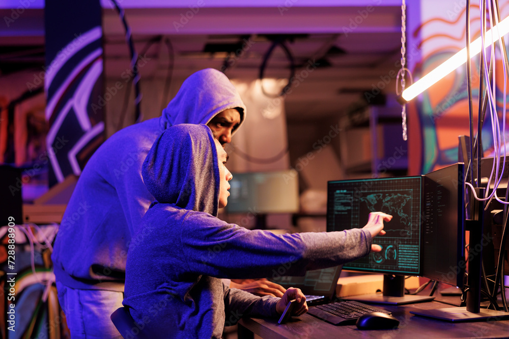 Hacker sharing ideas about breaking into government server, showing criminal ransomware code on ...