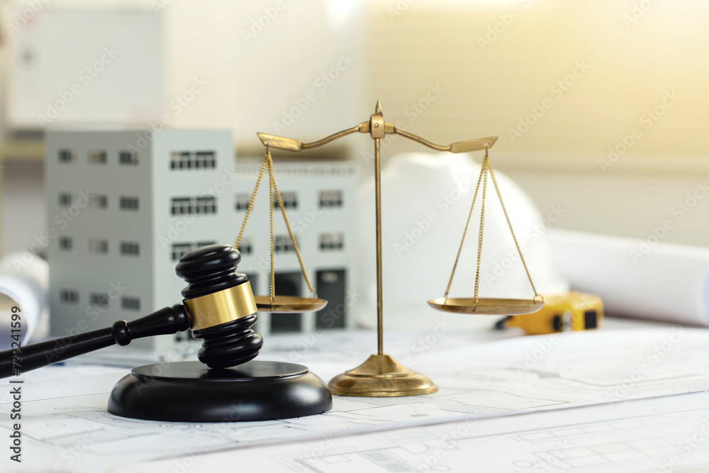 Labor, construction, and land law concepts. Judge gavel, scales of ...