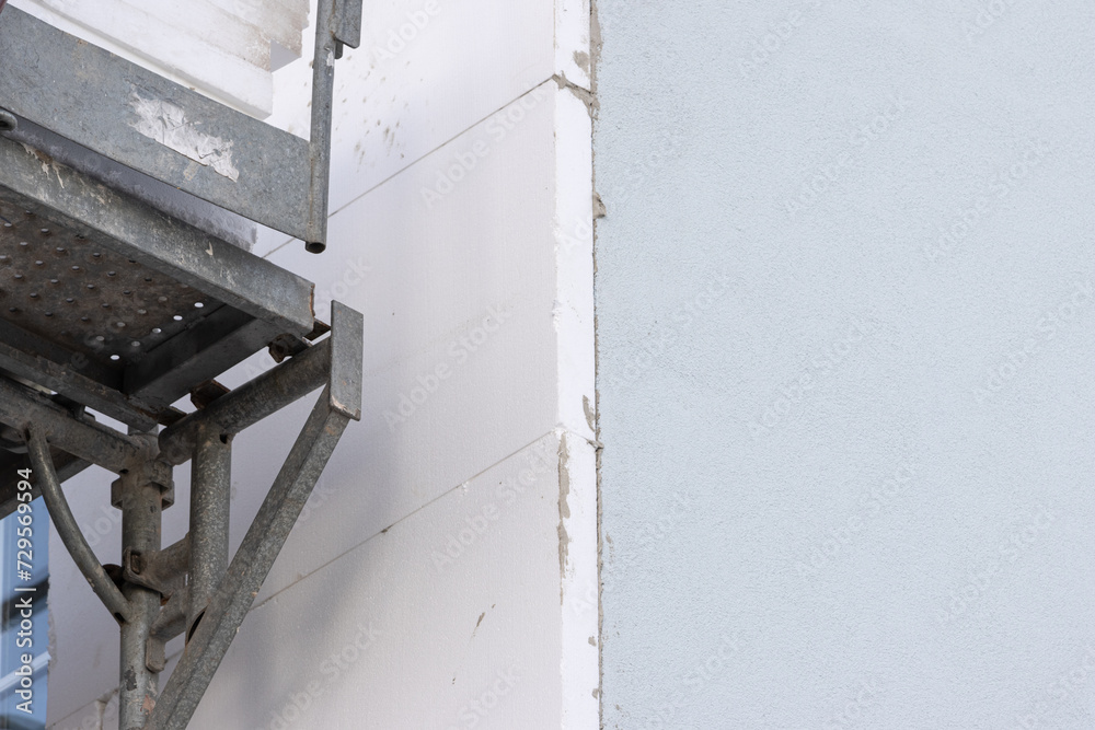 Renovation of the facade of an old building with External thermal ...