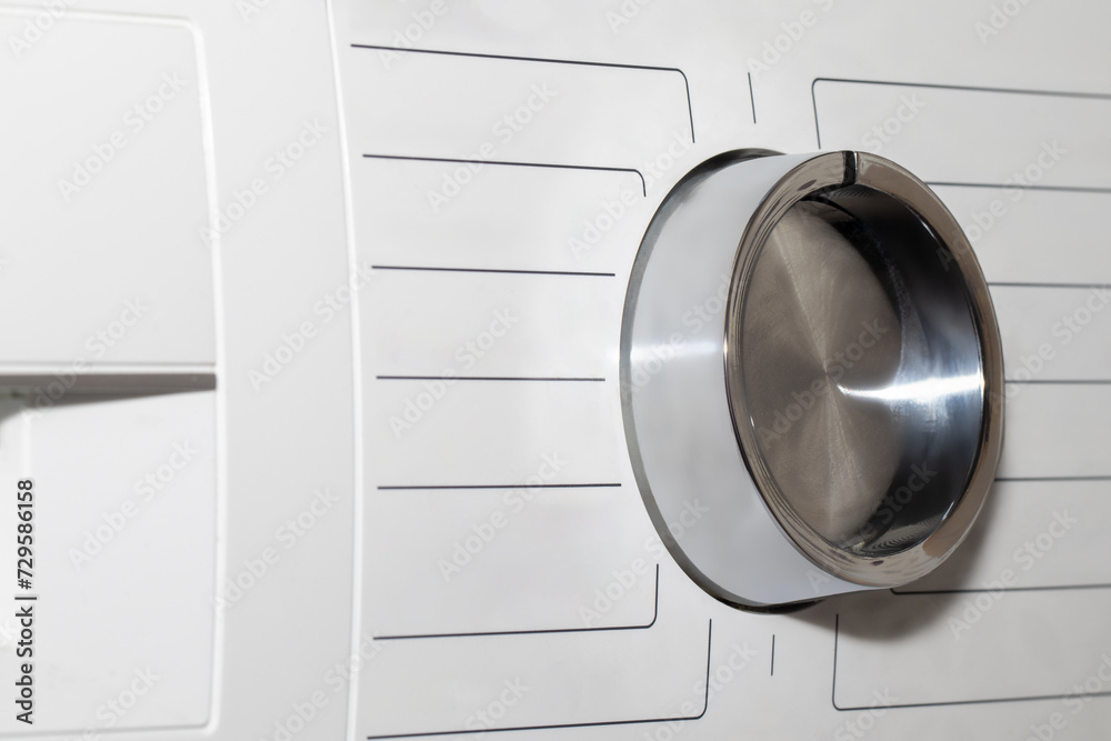 This image captures the detailed control panel of a modern washing ...