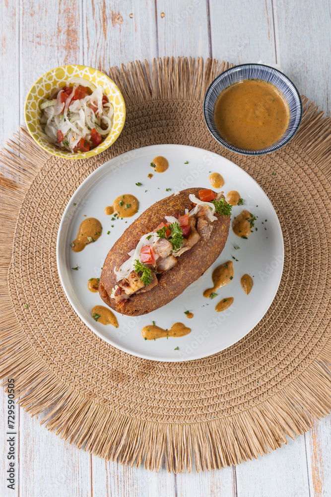 Corviche de verde relleno de carne de chancho en su interior con ...