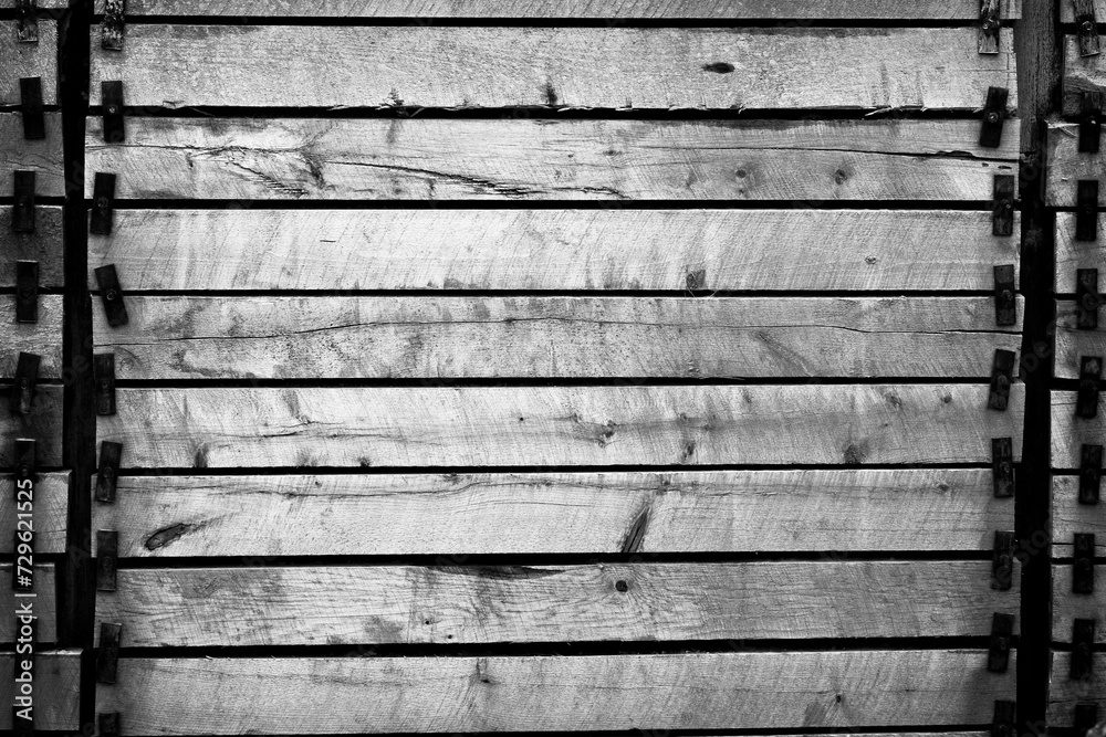 A close up background image of wood planks in a shoring system on a ...