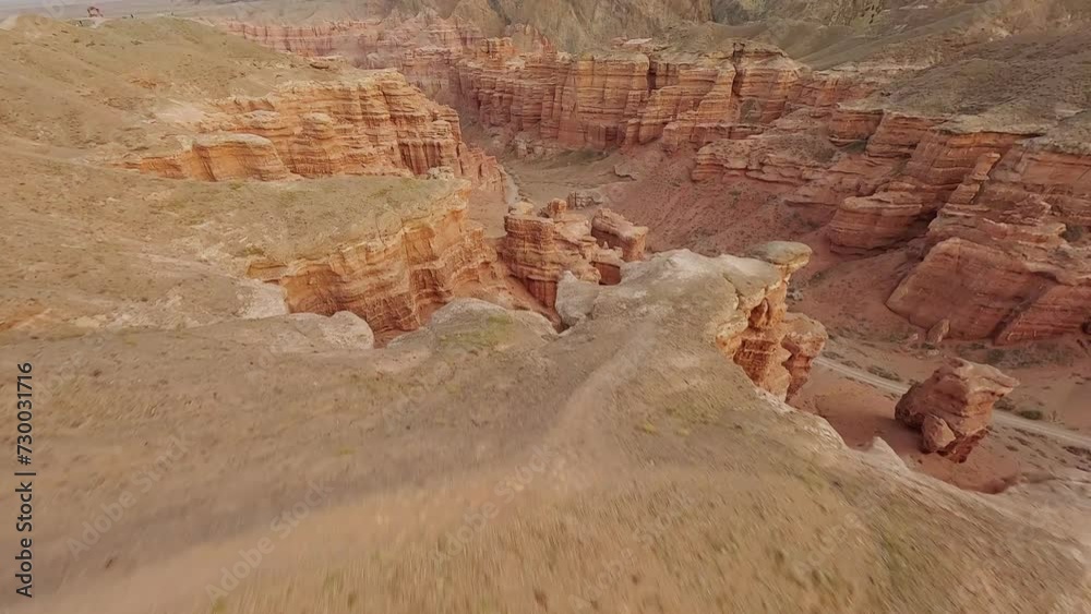 FPV drone dive shot mountain rock geology formation stone structure ...