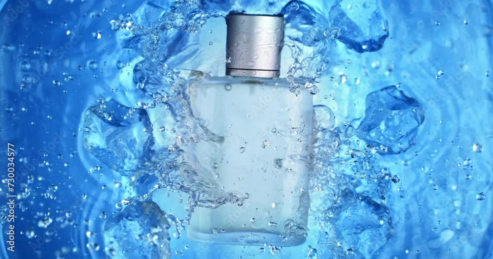 Super slow motion macro of luxurious classy perfume vial with a spray ...