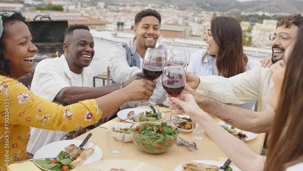 Multiethnic friends having fun at rooftop bbq dinner party - Group of ...