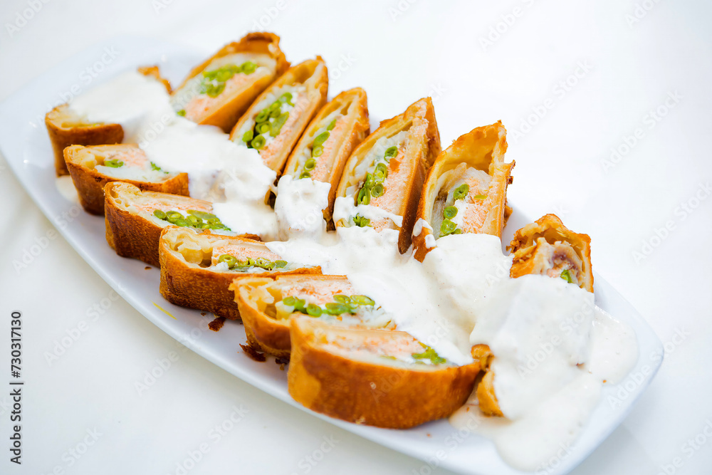 Indian bread: Indian bread rolls with green chutney on white plate ...