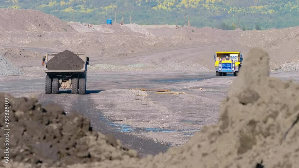 Mining Dump Trucks Cargo Box Filled With Excavated Material At Quarry ...