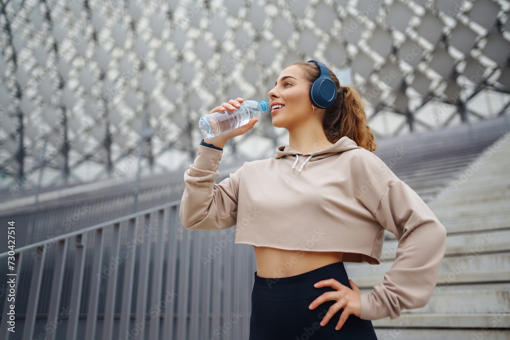 Beautiful young woman out for her morning workout. Getting fit is my ...