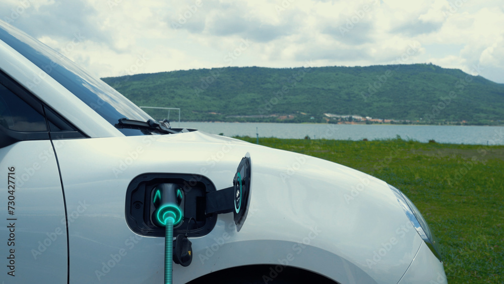Electric car plug in with charging station, recharge battery by EV ...