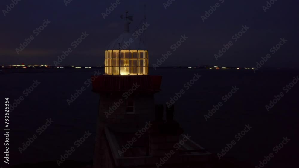 Dynamic aerial. 360 shot of Howth harbour orbiting around the ...
