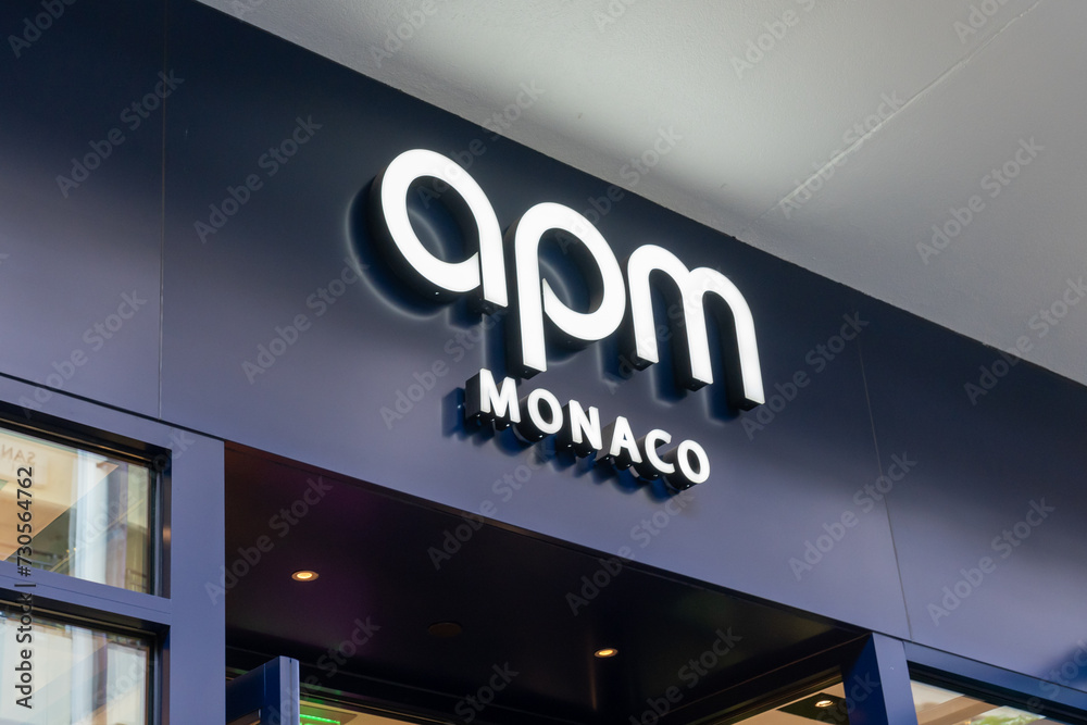 Honolulu, HI, USA - January 14, 2024: APM Monaco logo sign at their ...