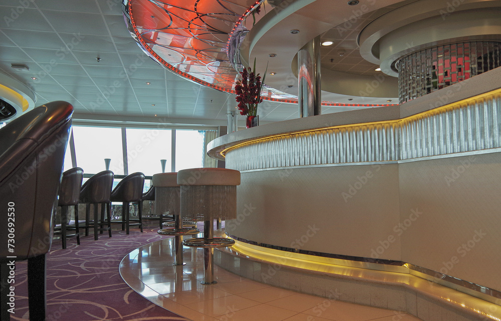 Elegant interior design furnishing bar lounge area onboard ocean liner ...