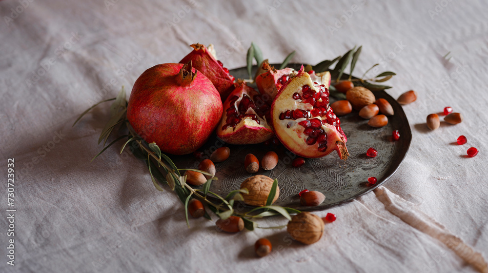 Image of Still Life with Turkish Pomegranate and olive branch on old ...