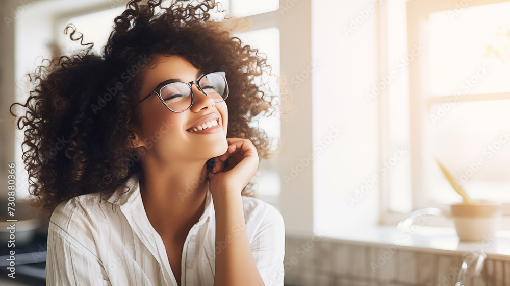 Woman experiencing a moment of pure bliss in a white-themed kitchen ...