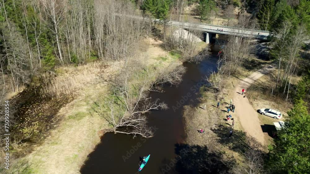 Canoeing, a type of rowing sport, follow of dual kayak going down the ...