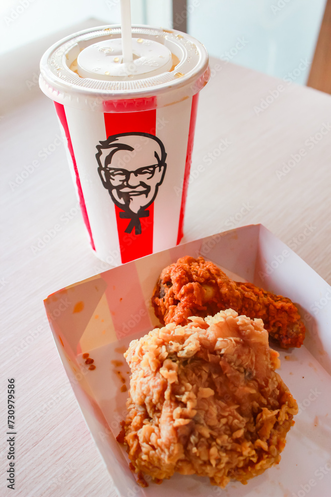 Bangkok, Thailand - January 07 2024 - Two pieces of KFC fried chicken ...