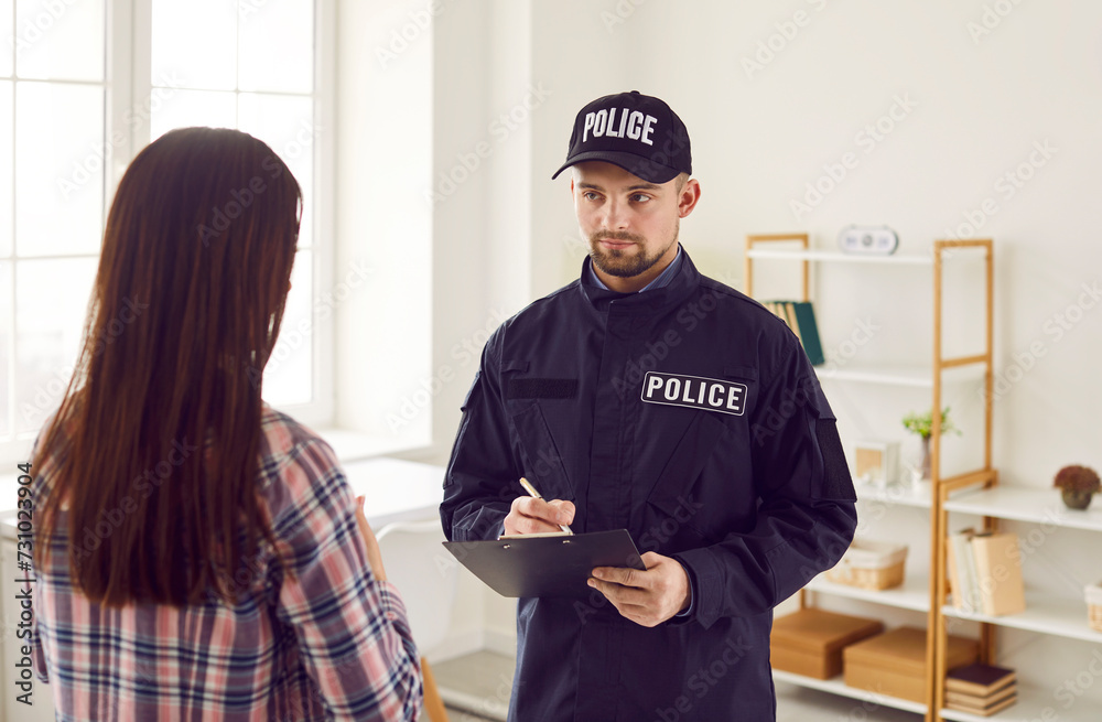 Police officer interrogating witness, victim or suspect. Serious ...