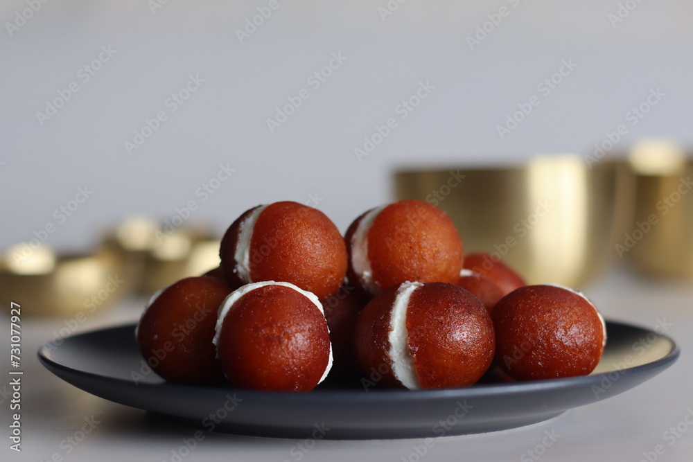 Malai Gulab Jamun. Gulab Jamun sandwich with milk cream filling. Fusion ...
