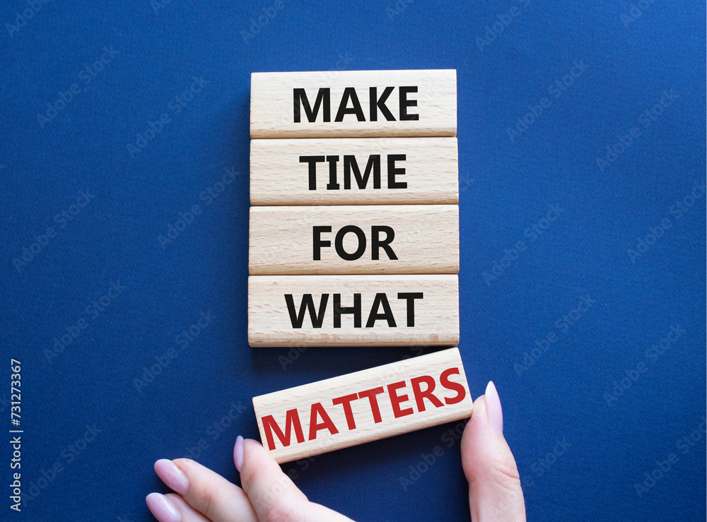 Important thing symbol. Wooden blocks with words Make time for what ...