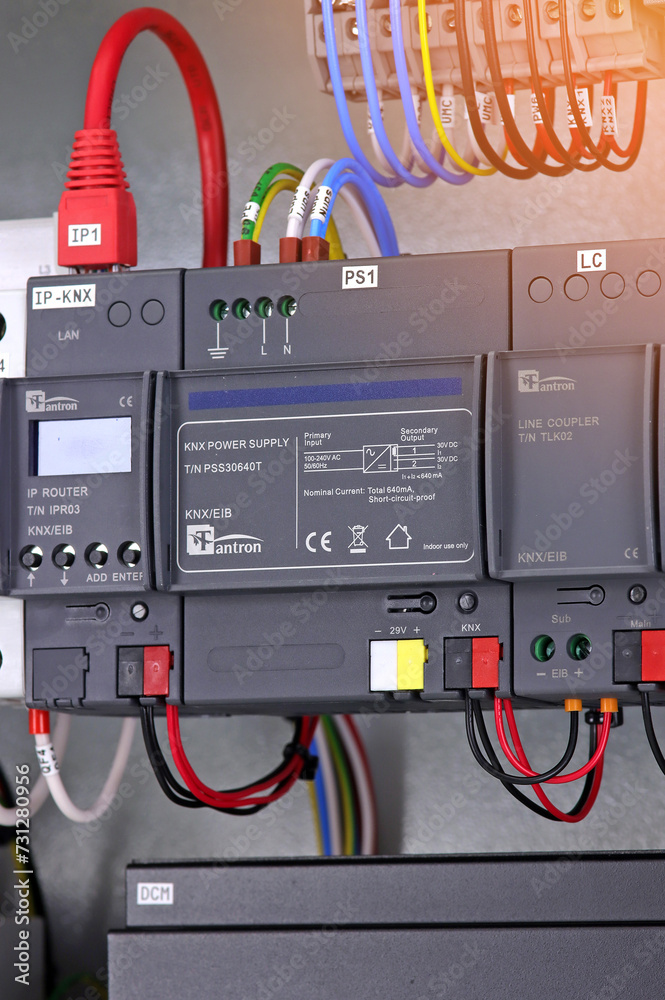 Electronic control modules for apartment automation are installed in an ...