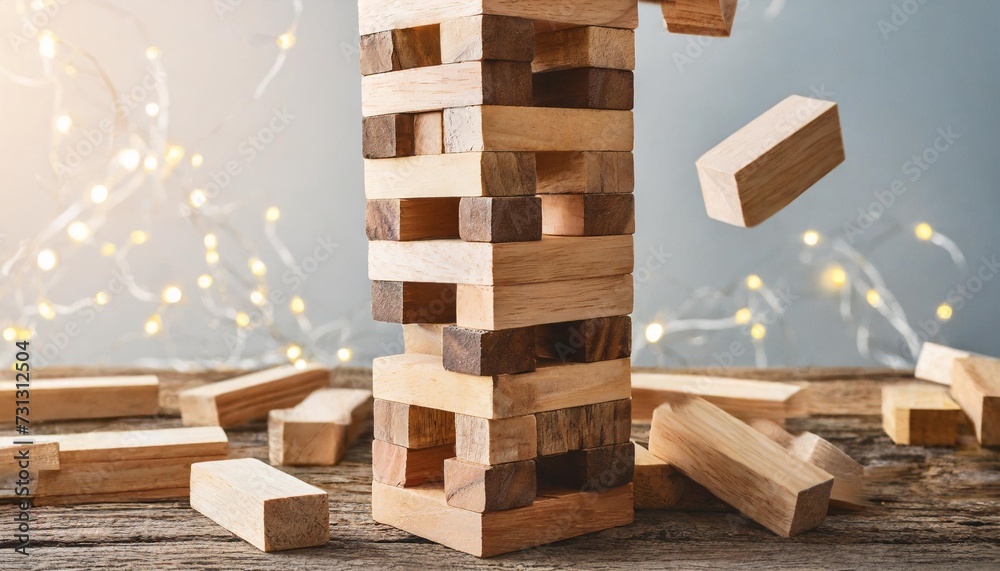 jenga tower made of wooden blocks falling on white background Stock ...