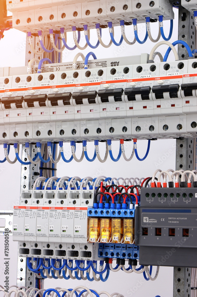 Electronic control modules for apartment automation are installed in an ...