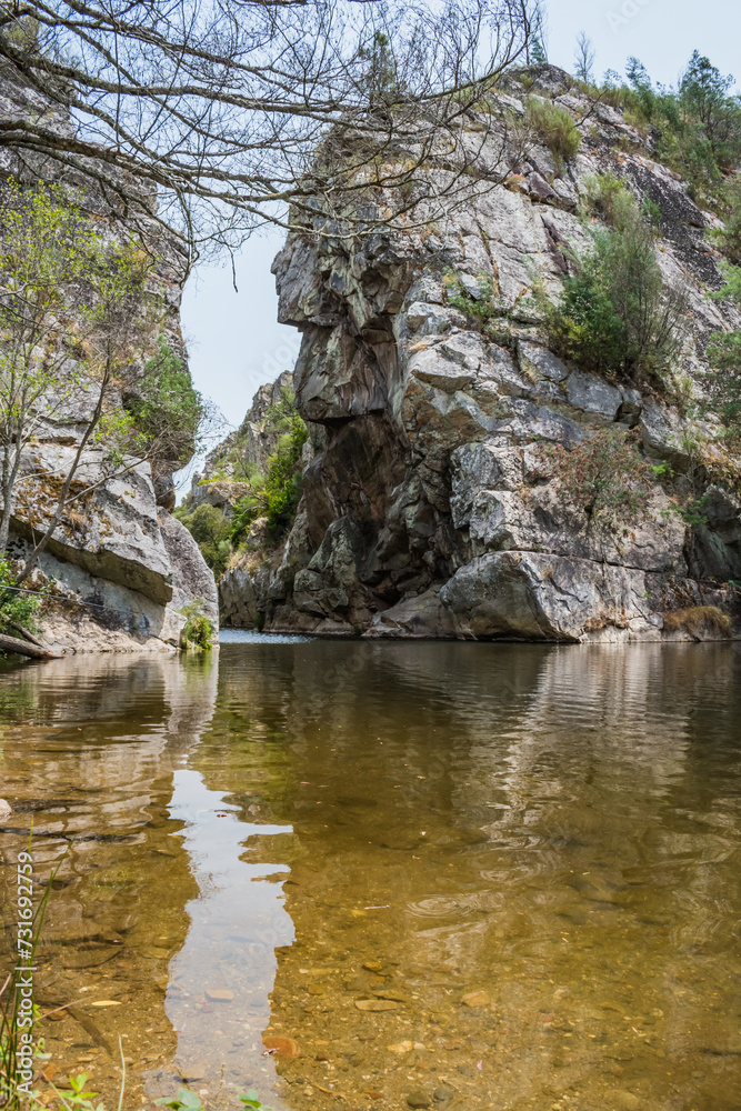 Transparent water of Ceira river beach in Garganta do Cabril geological ...