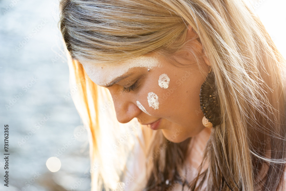 Aboriginal Australian woman on country in traditional dreamtime ochre ...