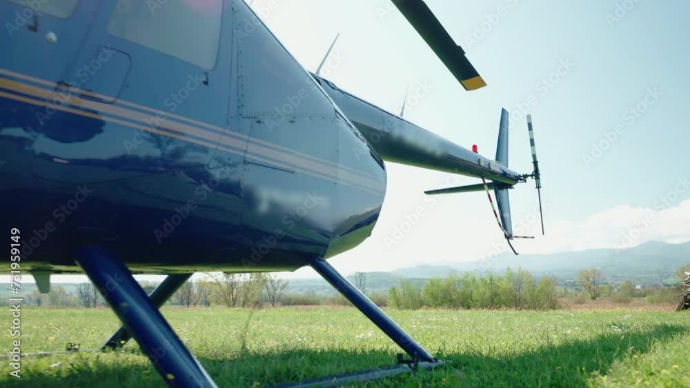 Private helicopter against sunshine background on airfield, powerful ...