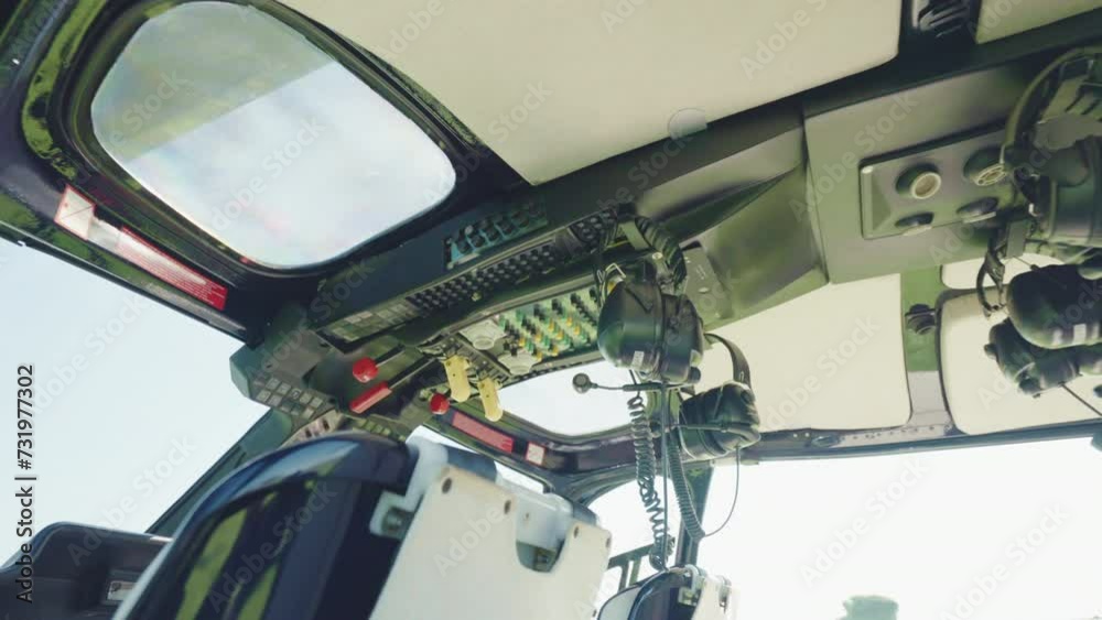 Inside view of helicopter cabin with different commands buttons and ...