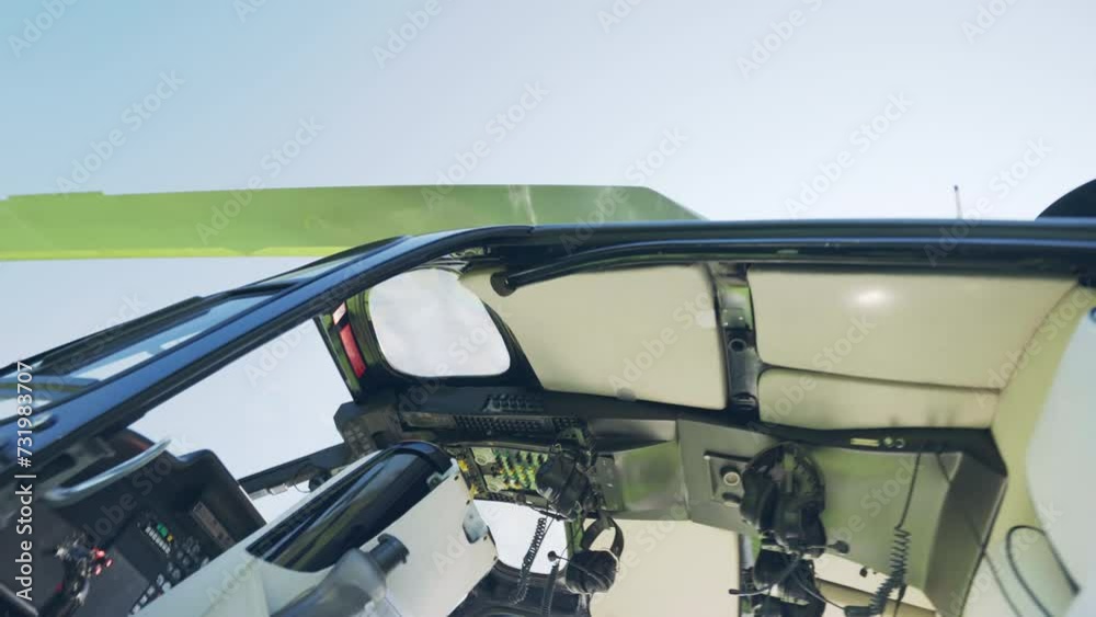 Spinning camera shot of helicopter interior cockpit with necessary ...