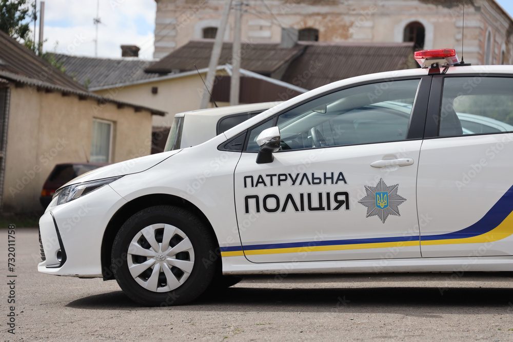 TERNOPIL, UKRAINE - JULY 7, 2023 Ukrainian patrol police white car with ...