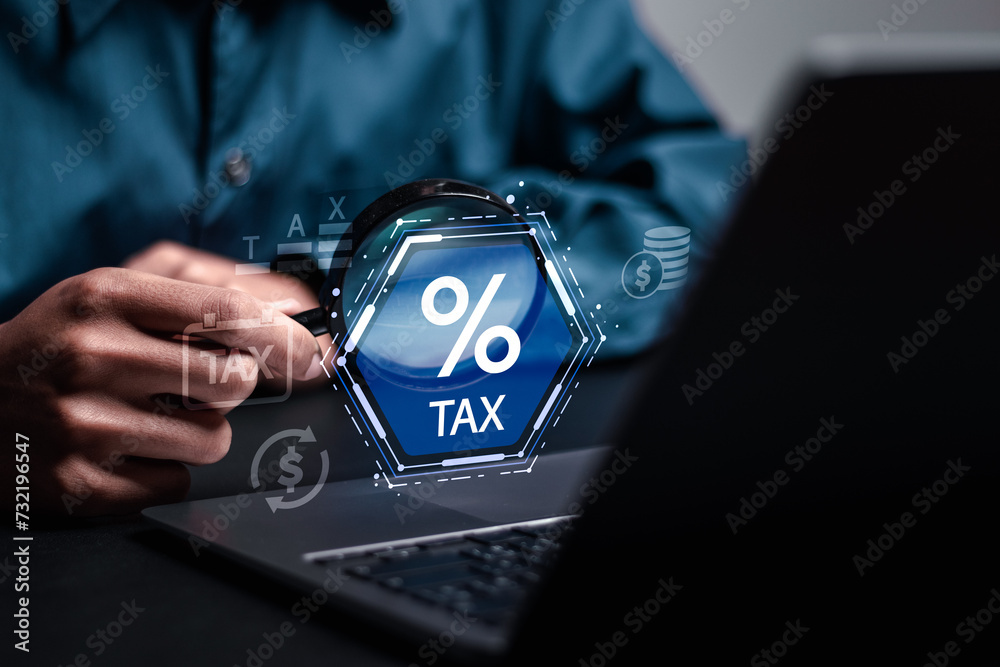 Calculation tax return taxes and VAT. Person use laptop with virtual ...