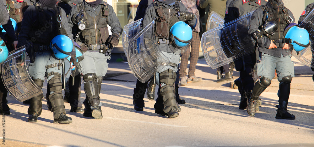 police in riot gear during the protest demonstration with helmets and ...