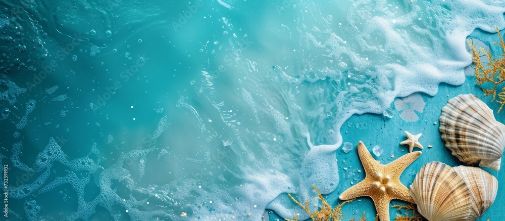 Aqua organisms, seashells and starfish, amidst electric blue waves on ...