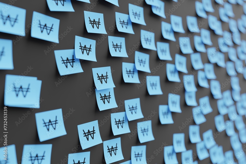 Many blue stickers on black board background with symbol of Korea won ...