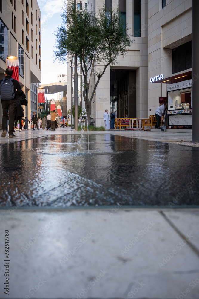 Doha, Qatar - February 3, 2024 - A small artificial lake with a ...