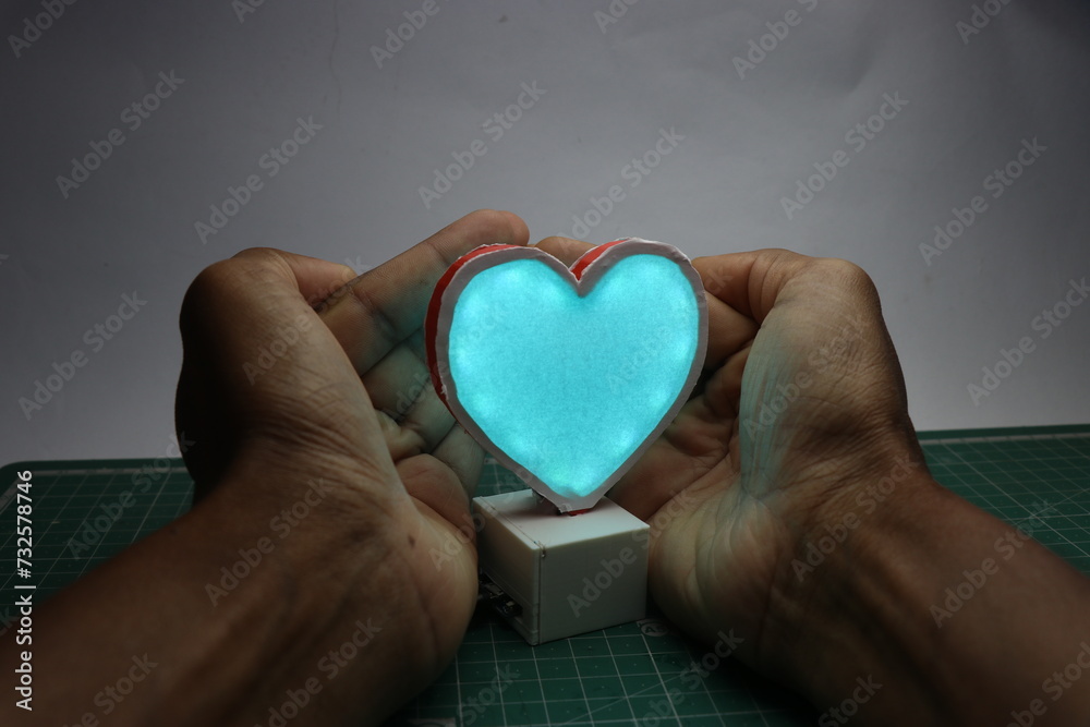 LED light with glowing color inside the shape of heart. Love concept ...